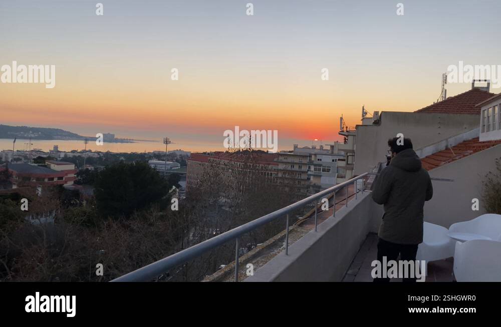 The man stand on building top on a beautiful night sky background. man ...