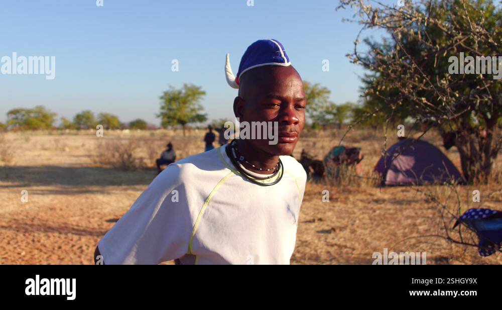 Himba tribe man with a special hairstyle for single, Oncocua, Angola ...