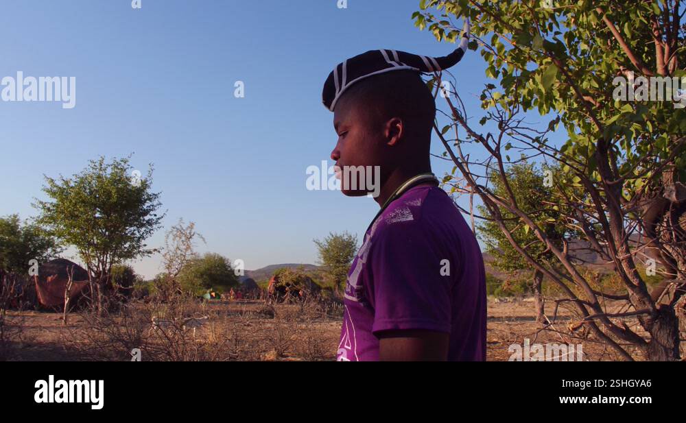 Himba tribe man with a special hairstyle for single, Oncocua, Angola ...