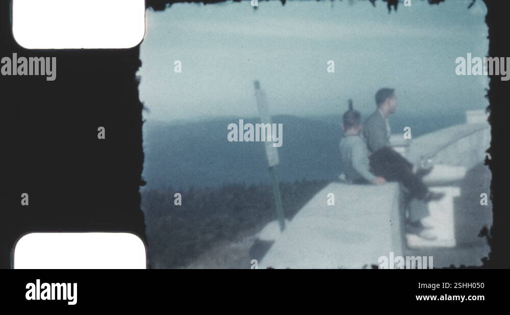People at a look out point on a mountaintop Stock Video Footage - Alamy