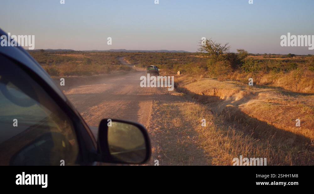Cars on a dirt road, Cunene Province, Oncocua, Angola Stock Video ...