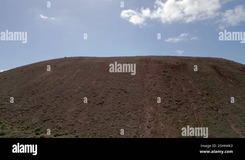 Perfect aerial view flight ascending droneTop of the Volcano crater tip ...