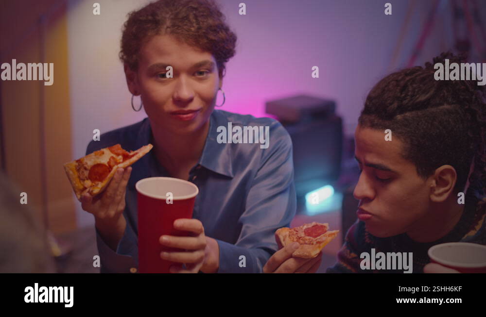 Diverse Friends Toasting with Red Cups at 80s Party Stock Video Footage ...