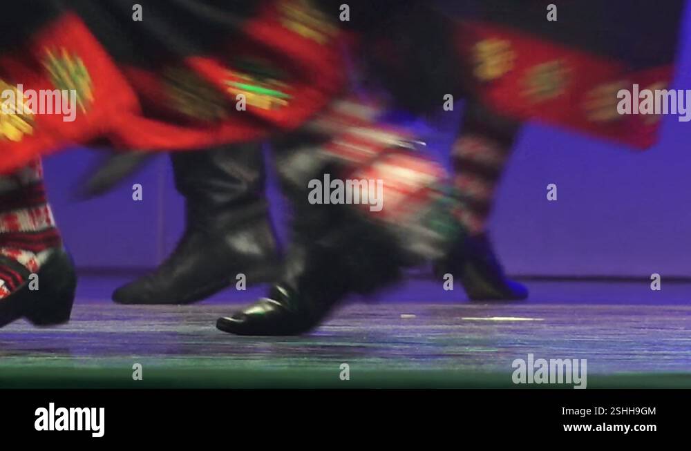 Latvian folk dances on stage. Leg movements on the dance floor Stock ...