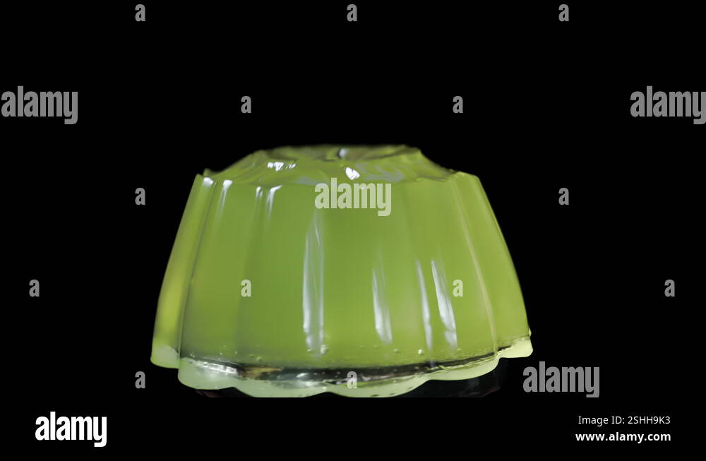 The green Jelly Rotates on a black background and I tap on top of it ...