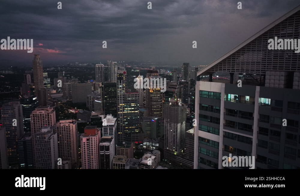 Flying Over The Evening Glowing Manila Stock Video Footage - Alamy