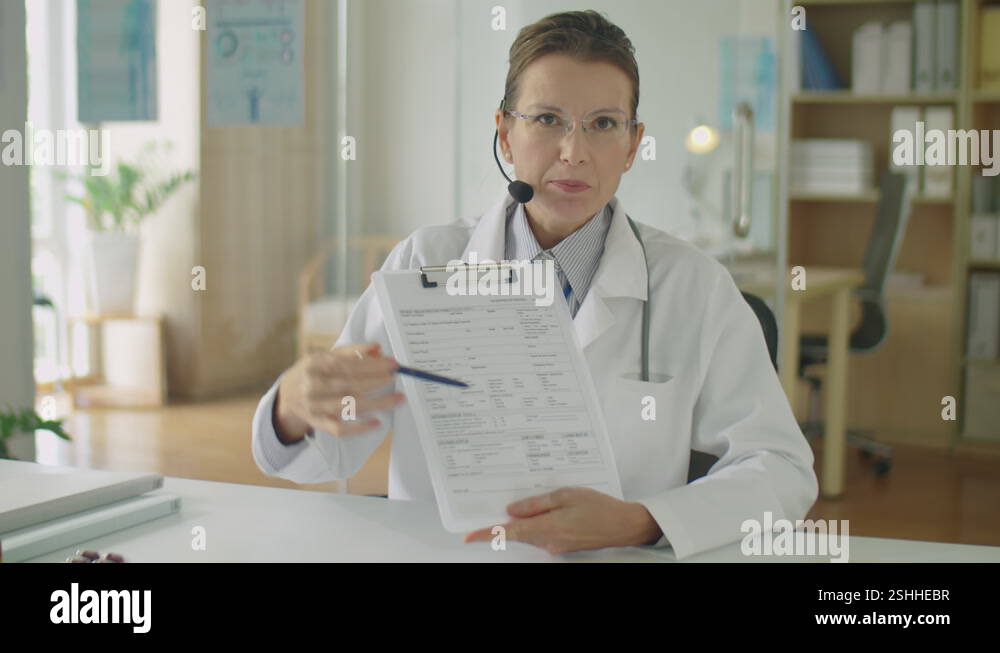 Female Doctor Explaining Treatment Plan on Video Call Stock Video ...