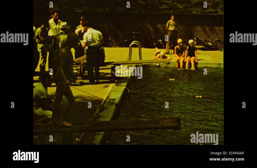 1930s: Girl dives into a pool. Title card. Children play in a wading ...