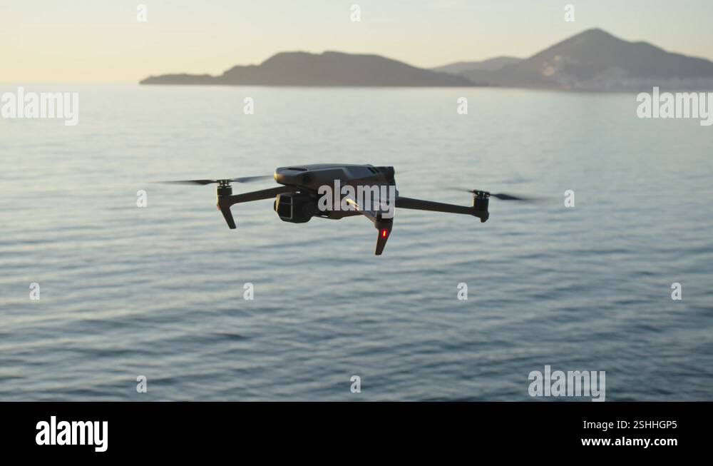 quadcopter mavic 3 hover over the sea and amazing Stock Video Footage ...