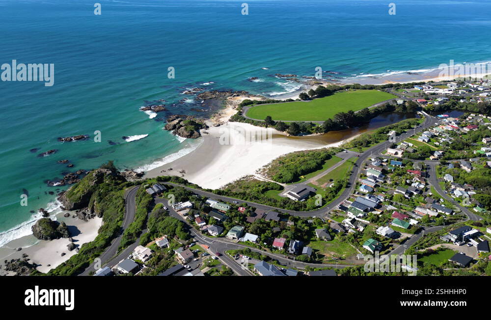 A top view of a coastline in Brighton, Dunedin area, New Zealand. A ...