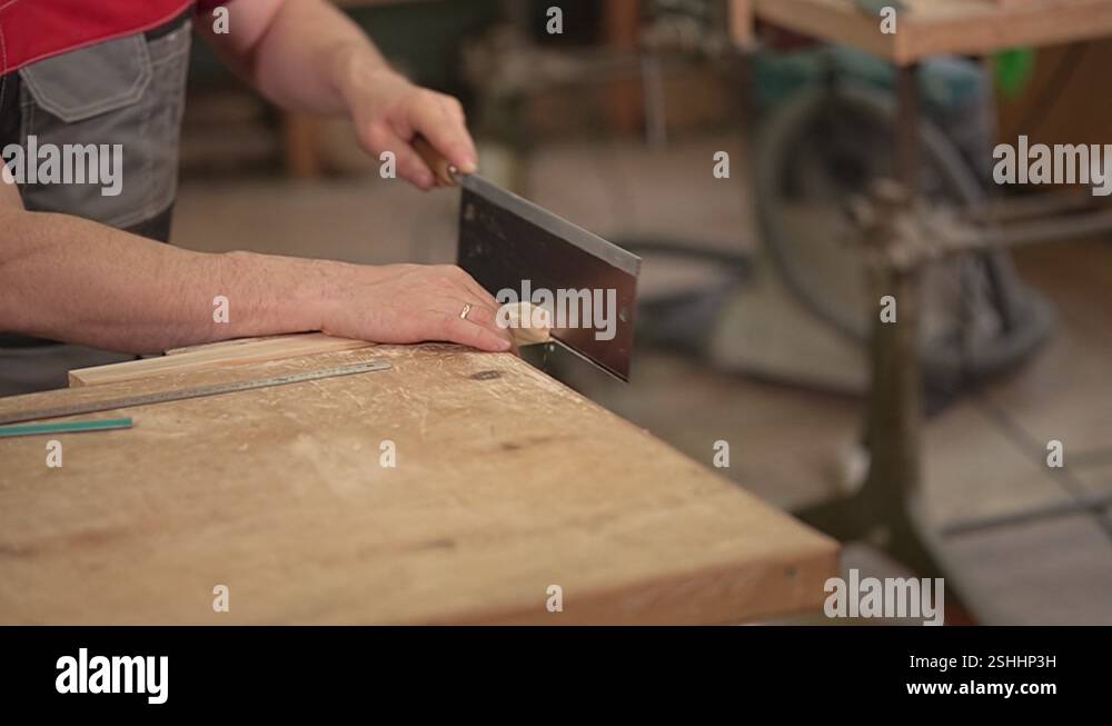hacksaw on wood Stock Video Footage - Alamy