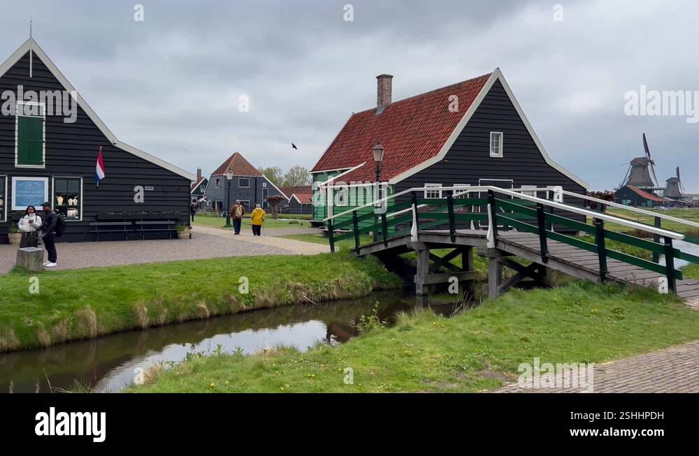Wooden mills rotating blades river town Zaanse Schans North Holland ...