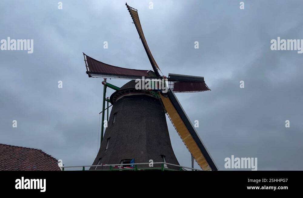 Wooden mills rotating blades river town Zaanse Schans North Holland ...