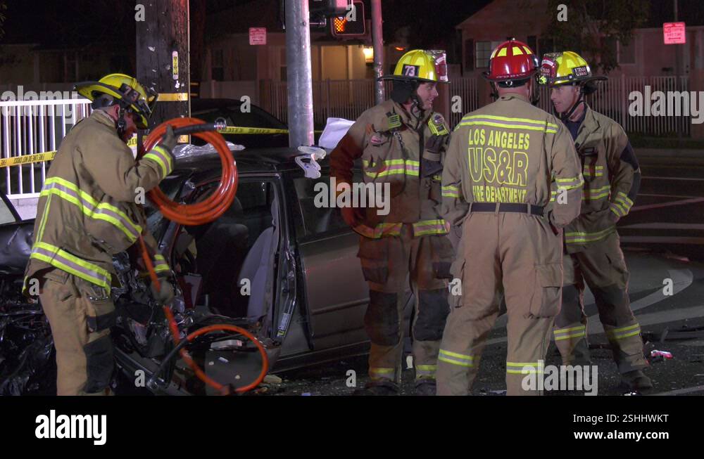 firefighters use specialized tools to cut car open Stock Video Footage ...