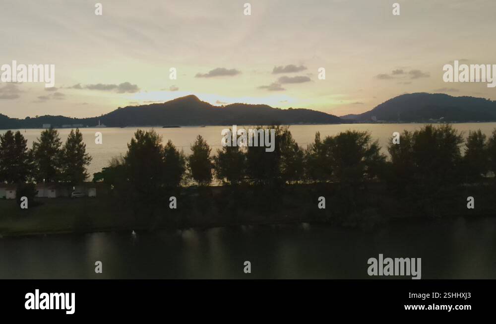 Pan shot View of sunset sky in Marina island, Malaysia. Aerial drone Stock Video Footage - Alamy