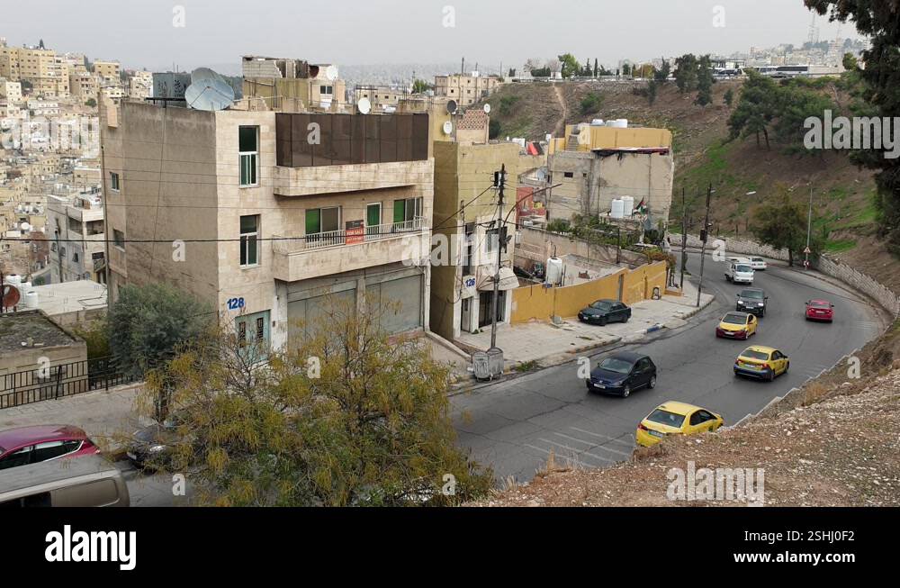Views of capital city Amman in Jordan with apartment blocks, houses ...