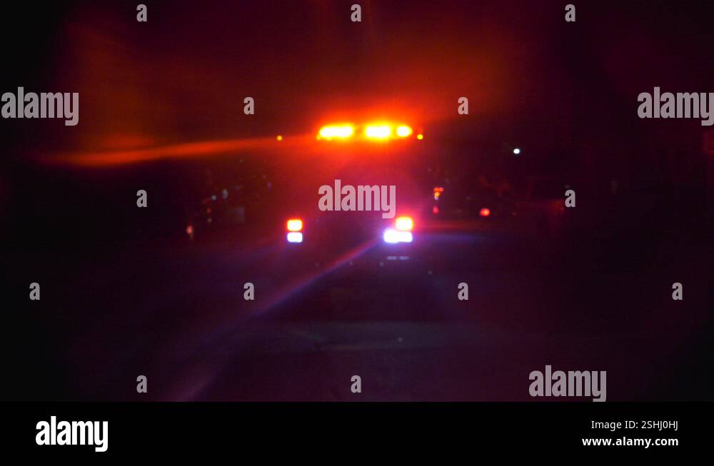 firefighters responding to emergency with lights and sirens Stock Video ...