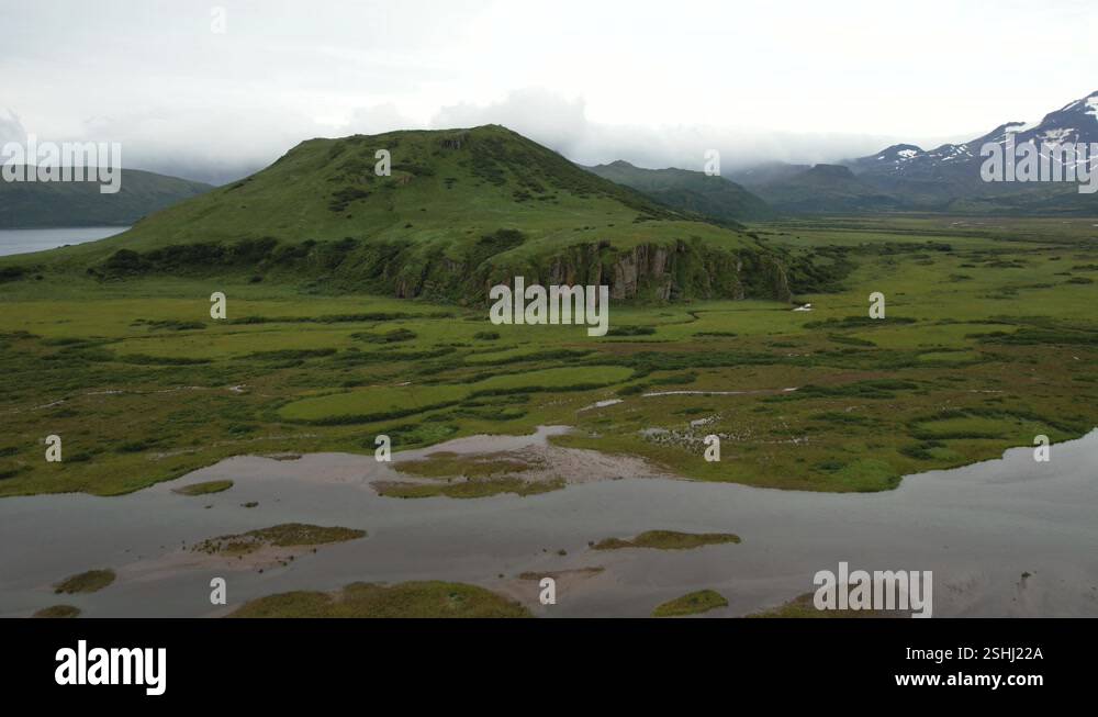 Scenic drone flight over a shallow lagoon in the Aleutian Islands ...