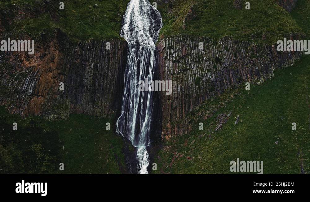 Bird-eye view on a beautiful waterfall at Tanadon Gorge. Drone shot of ...