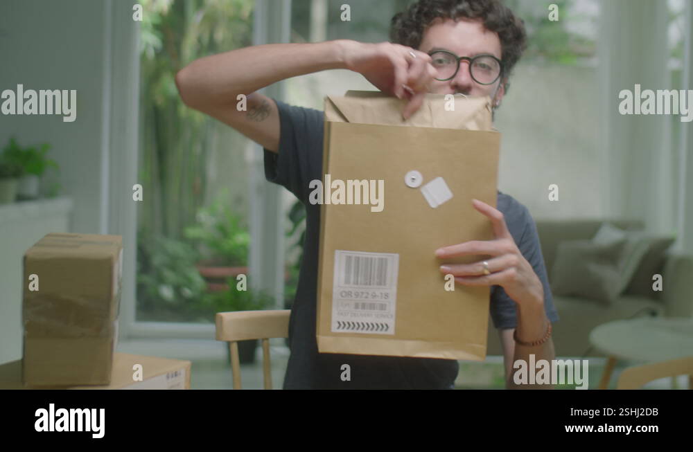 Unpacking order Stock Videos & Footage - HD and 4K Video Clips - Alamy