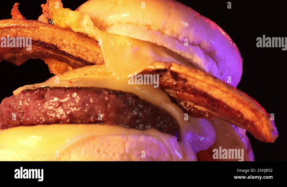 Burger made by professional chef, tempting and savory food spinning ...
