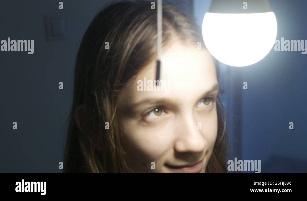 Girl Turn Off the Light in a Dark Room, Woman Turning the Light Off a ...