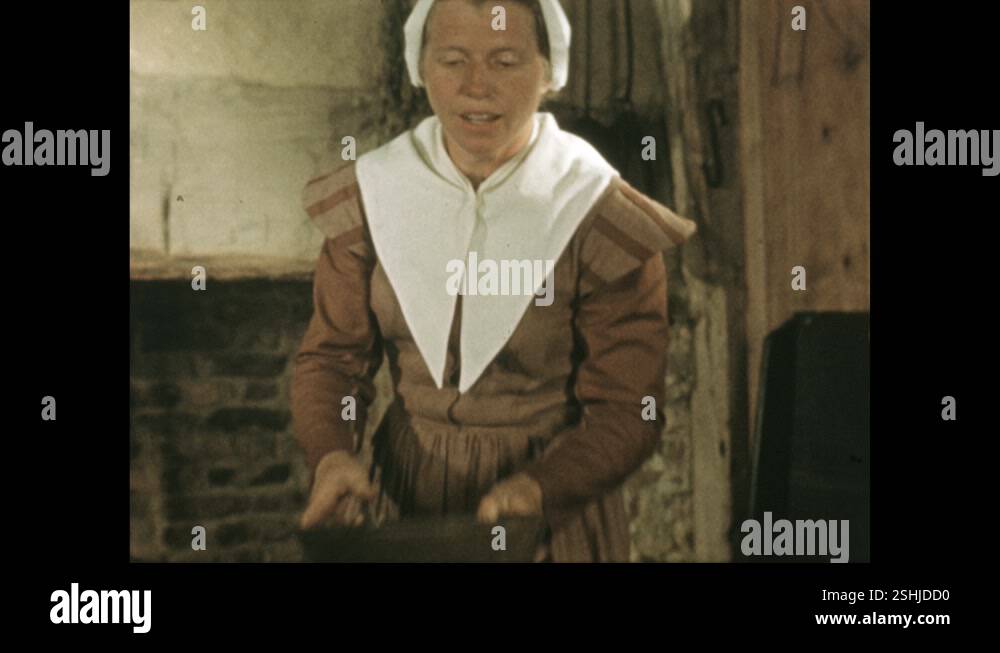 1600s: Woman in colonial costume mixing food, ladles food from pot in ...