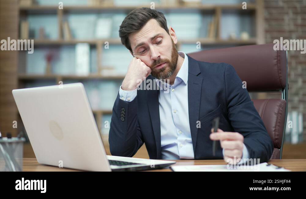 Boring lazy business man employee having long day working on computer ...