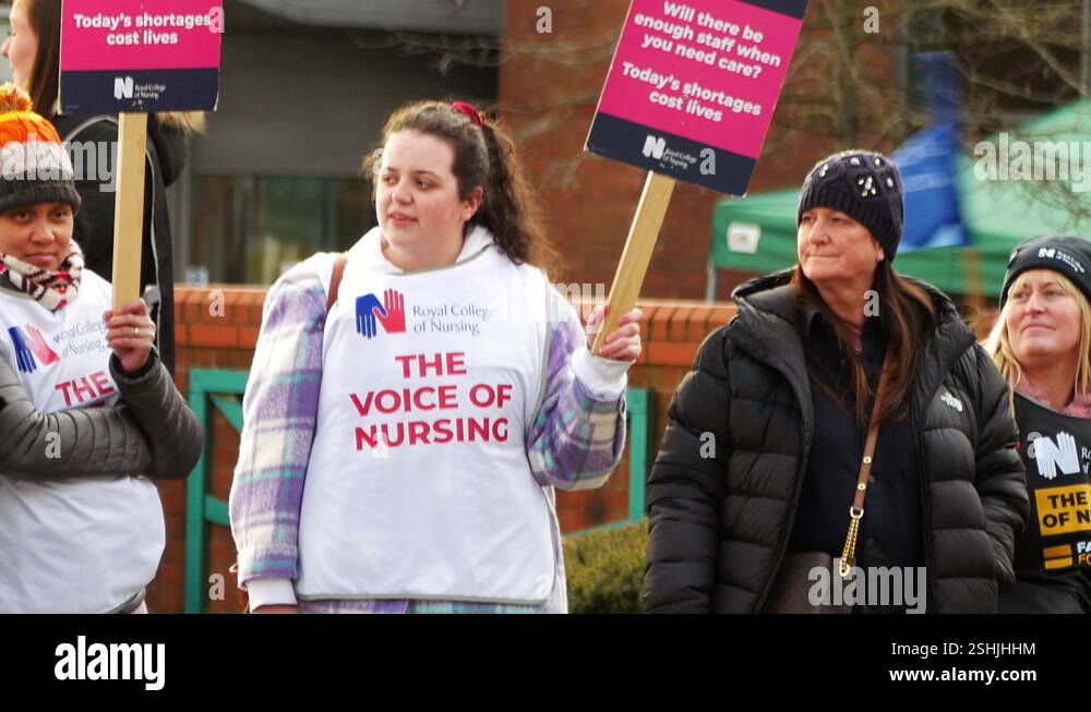 Underfunded and overworked NHS workers protest on the picket line with ...