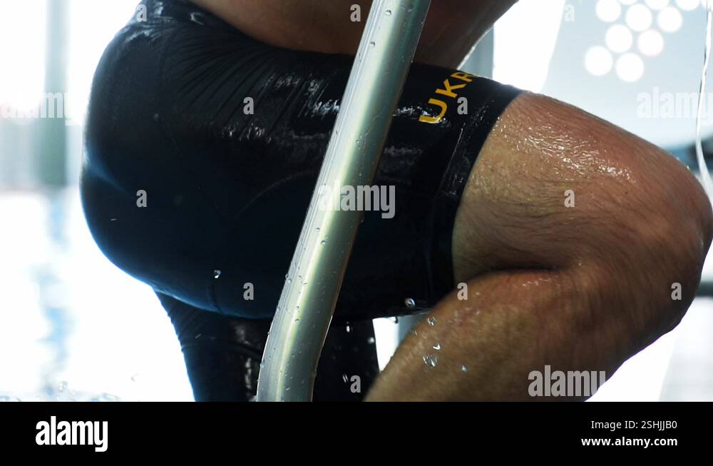 Athletic Person With Amputated Leg Going Out On Ladder From Pool After ...