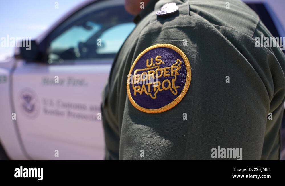 Border patrol agent standing next to unit Stock Video Footage - Alamy
