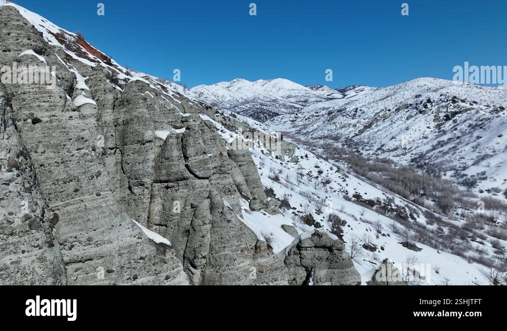 Aerial canyon rock erosion mountain winter snow eagle 2 4K Stock Video ...