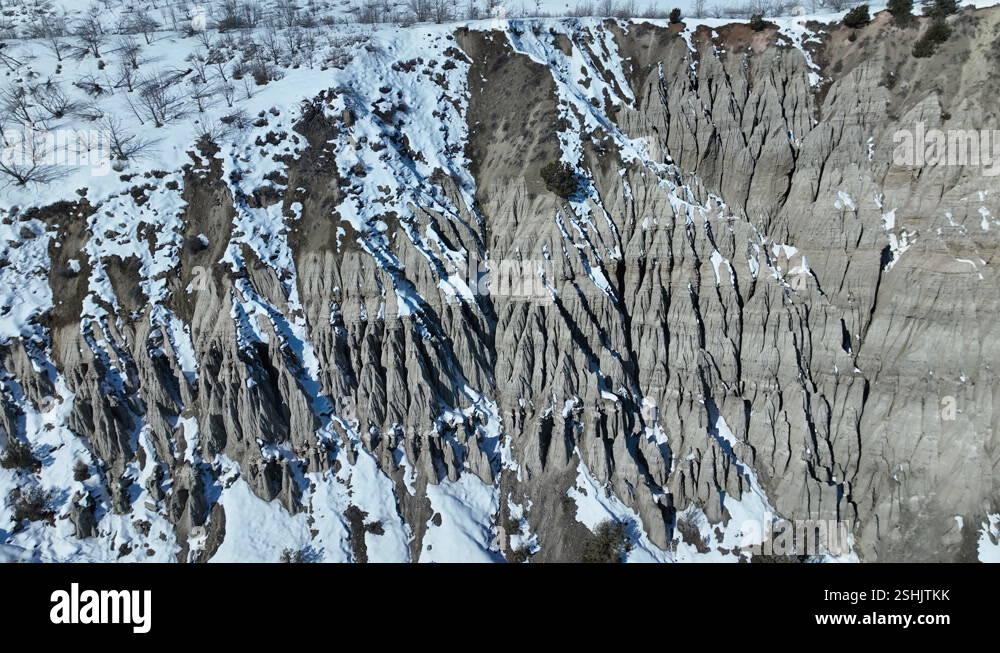 Aerial canyon erosion mountain landscape winter snow pan 1 4K Stock ...