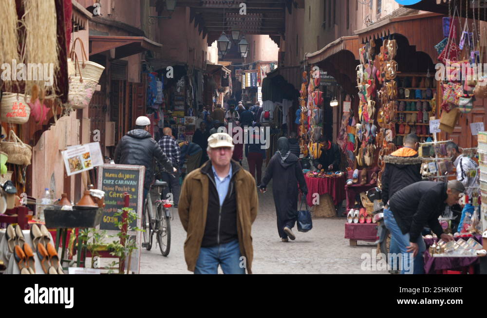 People walking in a shopping street in Morocco, Marrakesh, Medina Stock ...