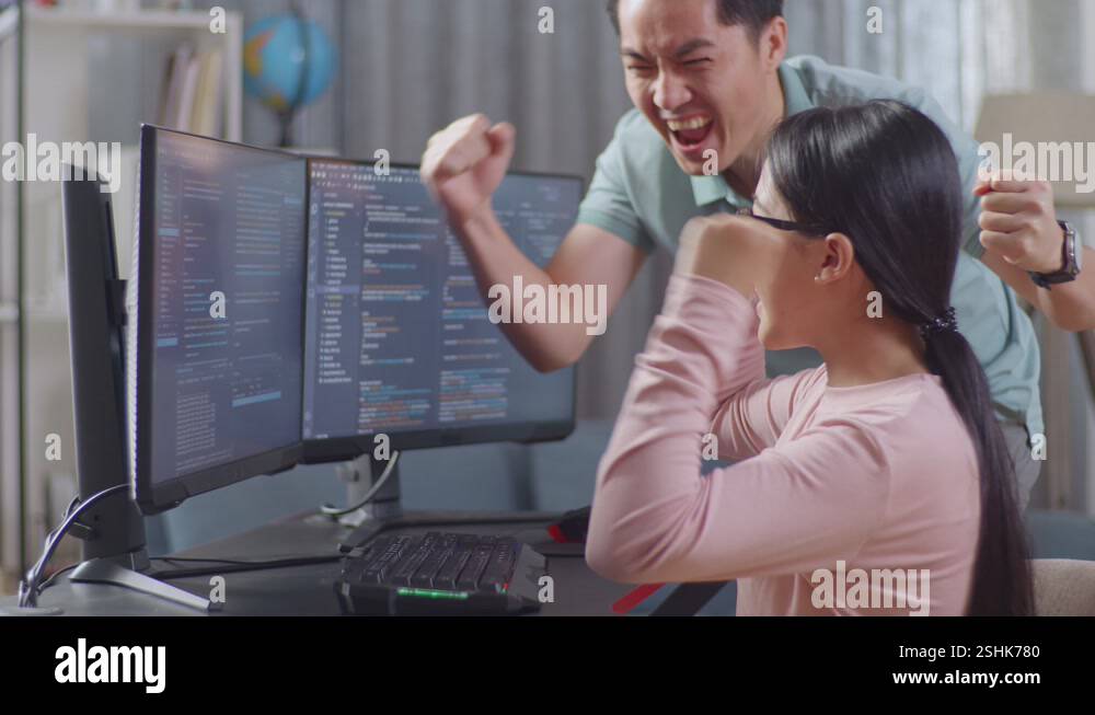 Happy Asian Teen Girl And Male Celebrating Succeed Creating Software ...