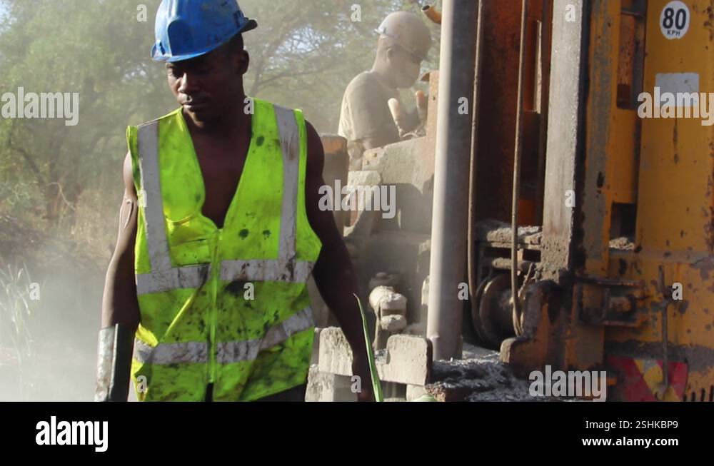 People drilling water. Rig engineering metal power man construction ...