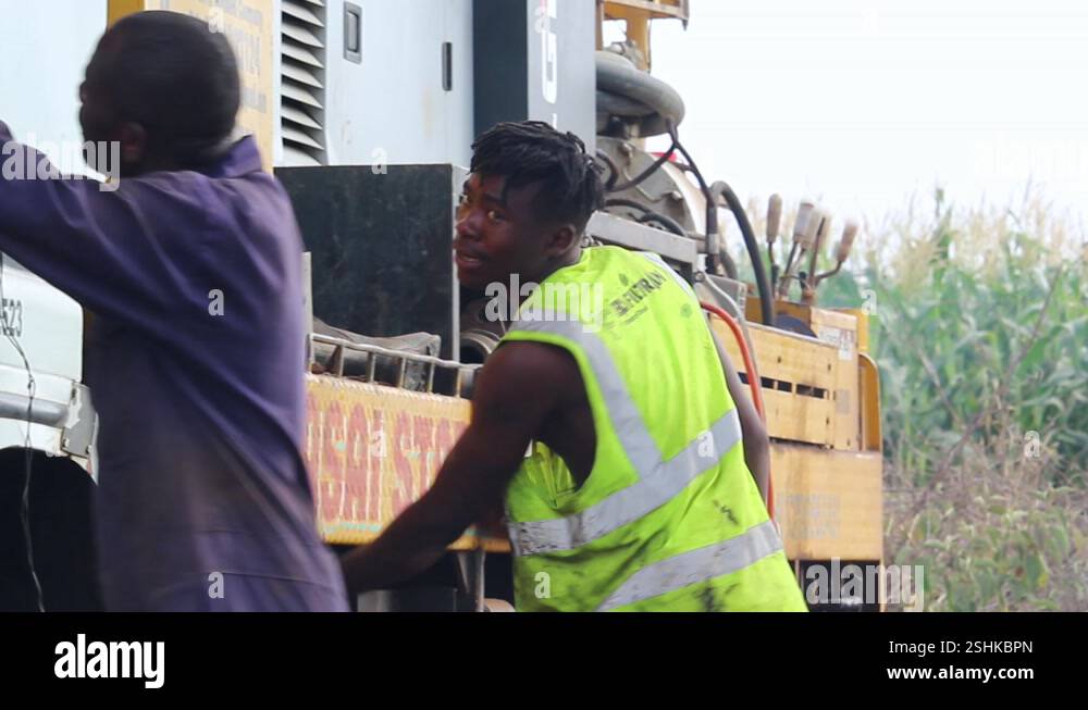People drilling water. Rig engineering metal power man construction ...