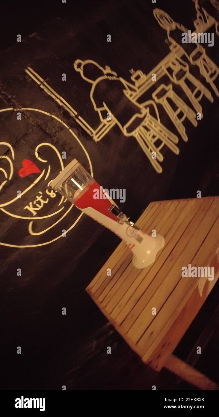 A dynamic FPV shot of the Emperador Brandy pitcher tower placed on a ...