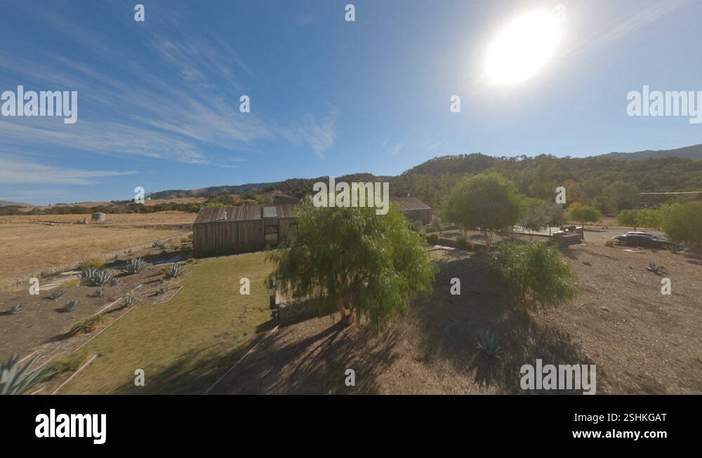 Desert beast Rezvani tank roaring on dirt road featuring trees and ...