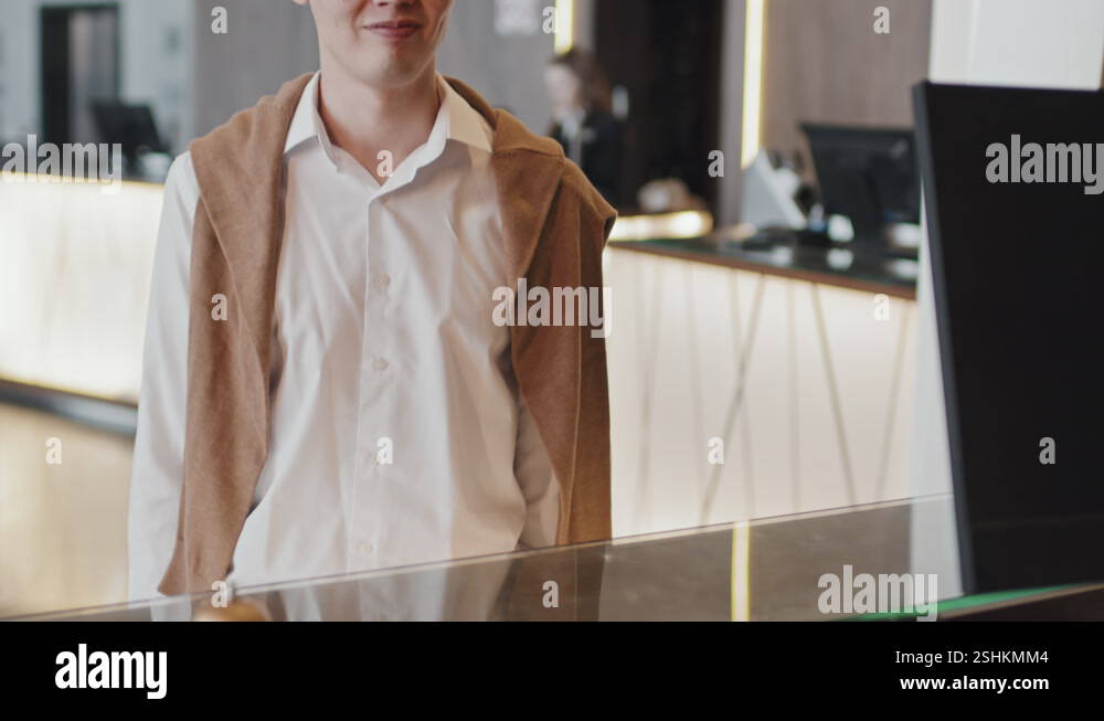 Asian Man Getting Room In Hotel Stock Video Footage - Alamy