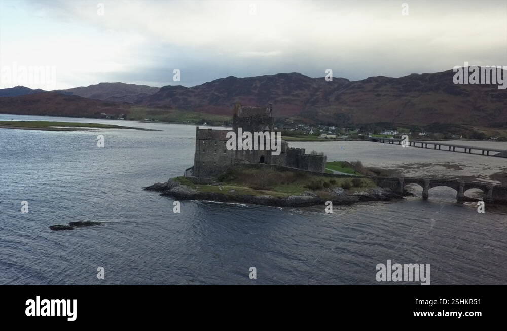 Eilean Donan Castle on small island in Loch Duich and Ardelve Scotland ...
