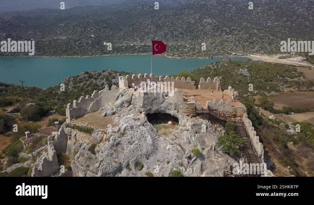 Ancient fort ruin built over cave on stone hilltop in southern Turkey ...