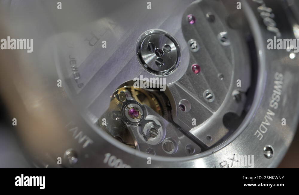 Cartier luxury wristwatch moving mechanical clockworks mechanism on ...