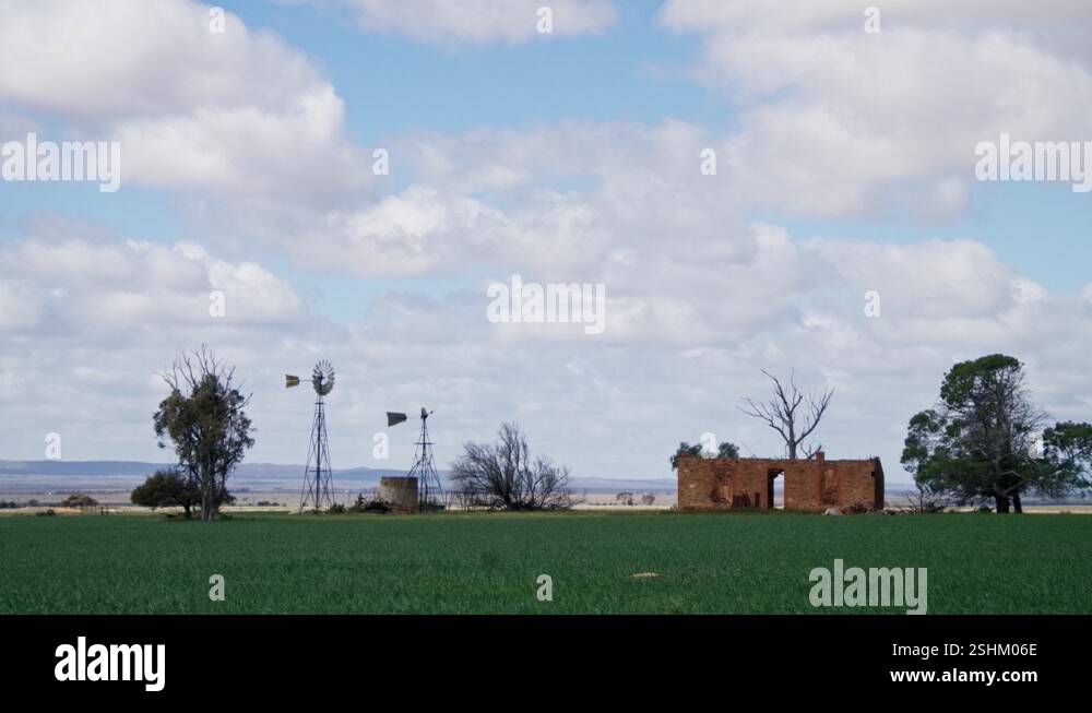 Flinders Rangers Orroroo Ruin in Field Windmill turning Windy 001 Stock ...