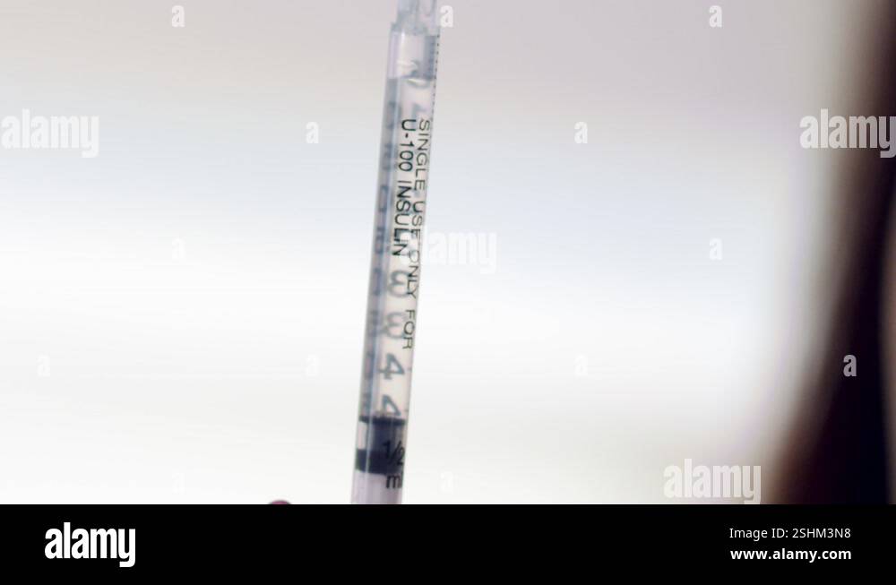 Pushing the air out of a syringe of medication - macro Stock Video ...