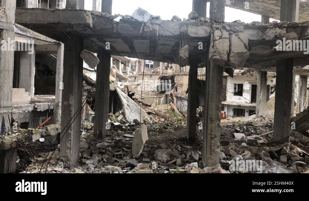 Destroyed and empty homes in the city - low angle - medium shot Stock ...