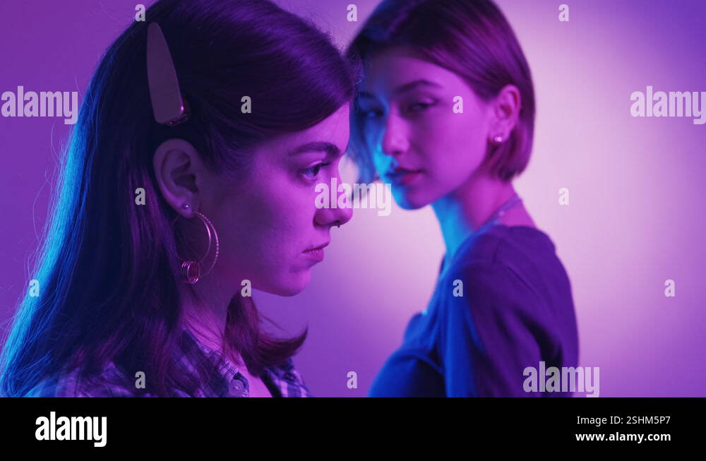 Sisters problem female secrets neon light portrait Stock Video Footage ...