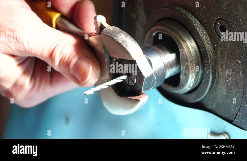 metalworking industry: close up hole drilling in copper bars for ...