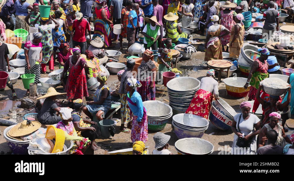 Cape Coast Ghana Elmina market village fishing crowd argue 4K Stock ...