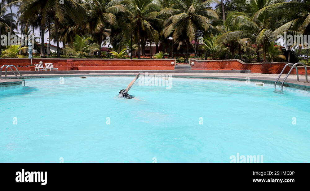 Cape Coast Ghana beach resort woman swim pool 4K Stock Video Footage ...